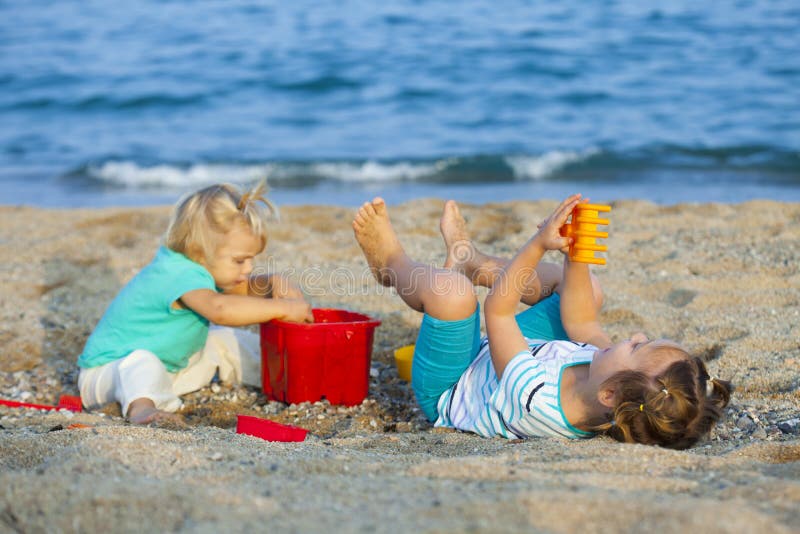 Children at the Seaside. Girl with a Water Mask on the Sea. Sports ...