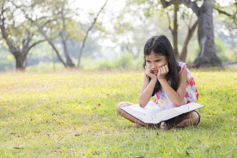 Girls sit and reading stock image. Image of strain, skin - 51437335