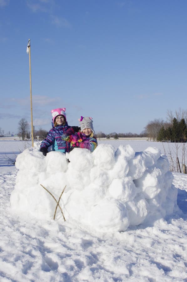 Girls in snow fort stock image. Image of outside, country - 89455597