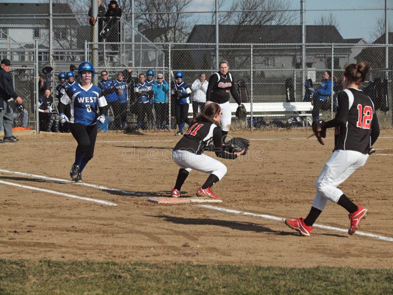 Girls Softball Runner on First Editorial Stock Image - Image of girl ...