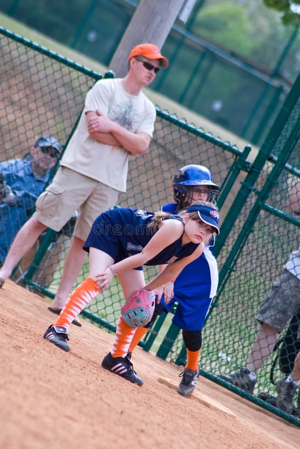 Girls Softball Runner on First Editorial Stock Image - Image of girl ...