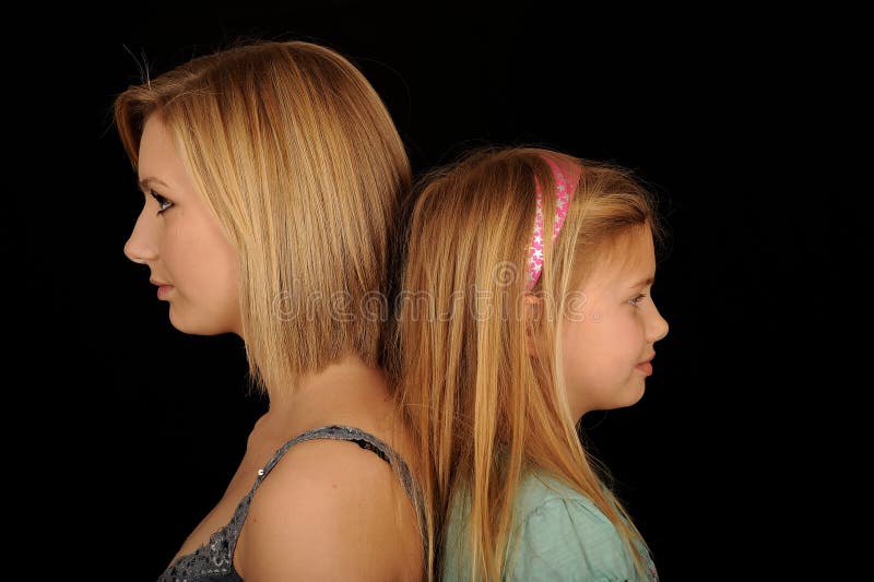 Girls Standing Back To Back Stock Image - Image of profiles, girls: 9041439