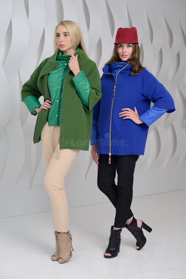 Girls in Studio Posing at Coats Stock Photo - Image of manager ...
