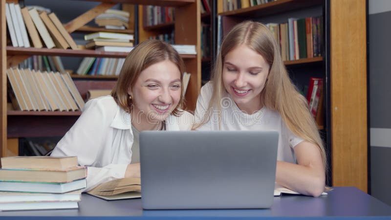 4K. the Girls Study Together in the Library. Students Prepare for Exams ...