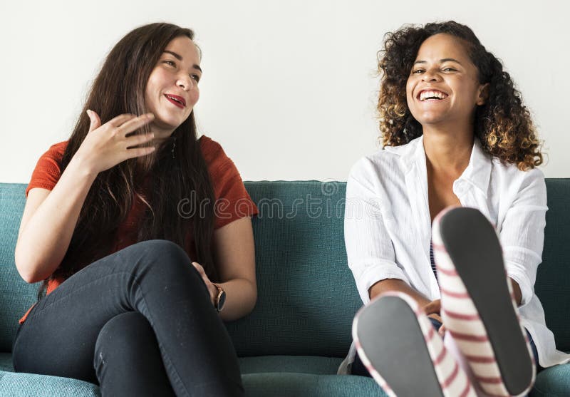Girls Talking Together on Couch Stock Photo - Image of love, caucasian ...