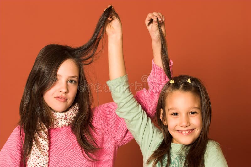 Girls touching hair stock photo. Image of beautiful, pretty - 2054694