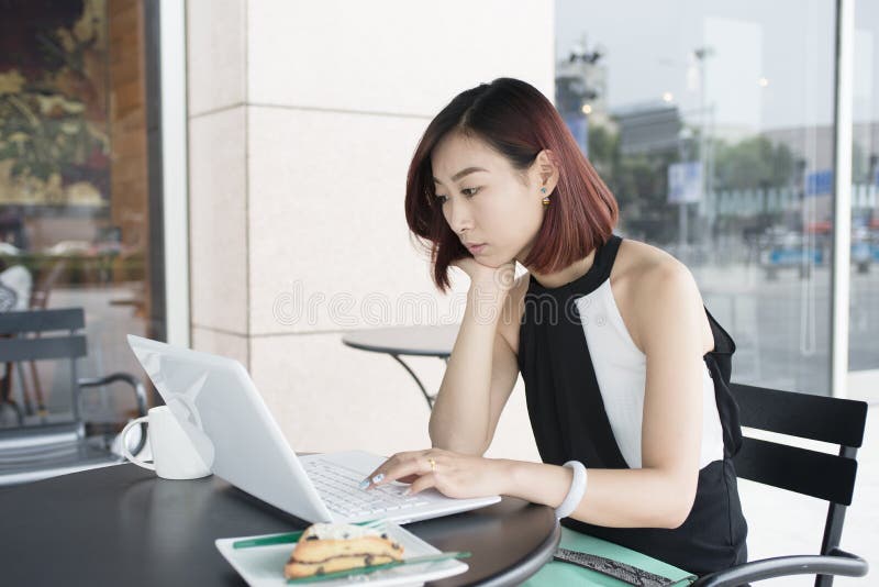 Girls use computers stock photo. Image of shop, adult - 92927430