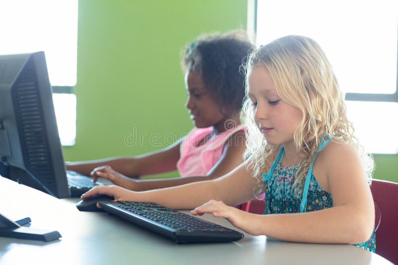 Girls using computers stock image. Image of group, electronic - 77703535