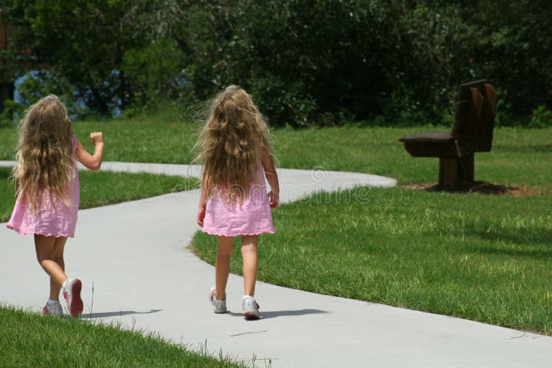 Girls walking in the park stock photo. Image of park, walking - 1331508