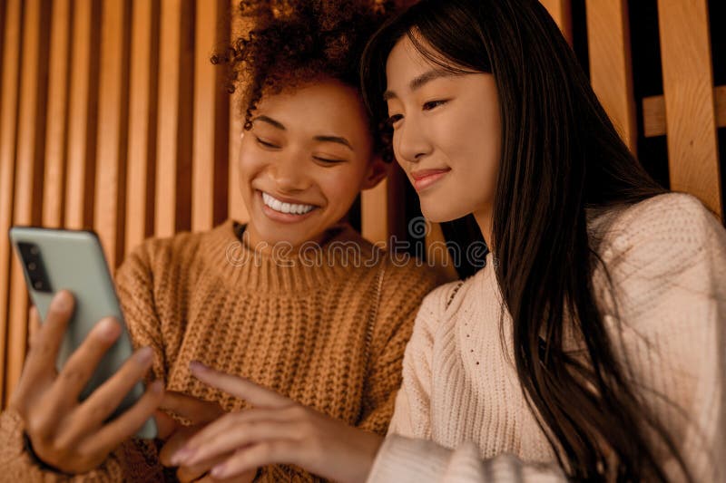 Girls Watching Something on Internet and Looking Interested Stock Photo ...