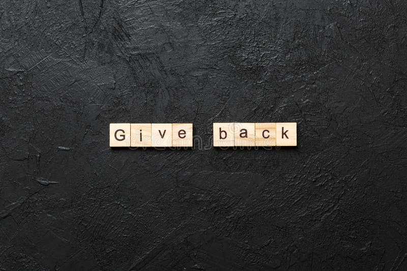 Give Back Word Written on Wood Block. Give Back Text on Table, Concept ...