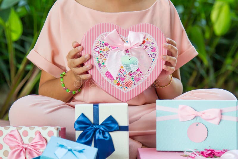 Give the gift box stock photo. Image of celebration, people - 92152046