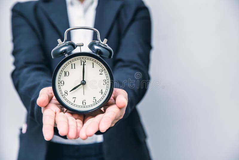 Give a Times Concept. Time Clock in Business People Hand with Space for ...