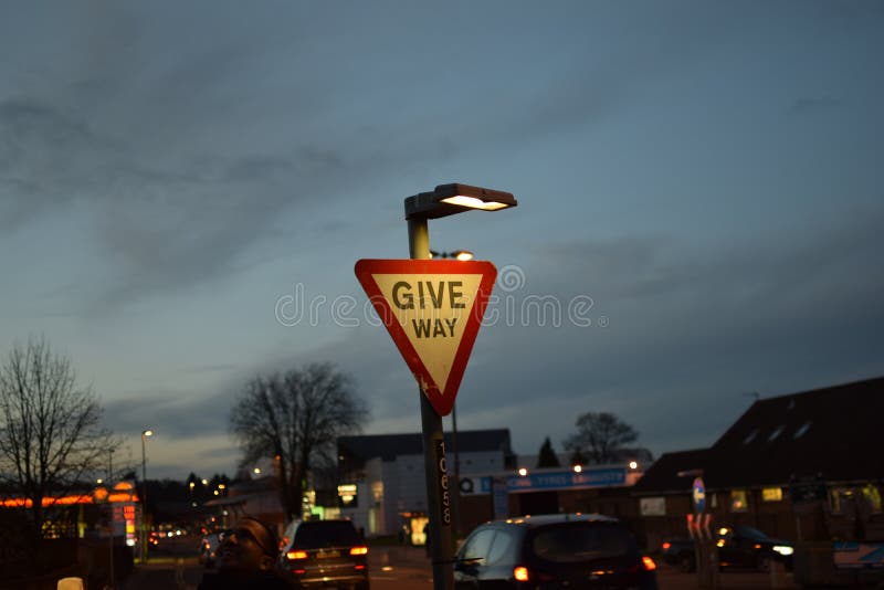 Give Way Road Sign at Night Stock Photo - Image of sign, night: 114919432