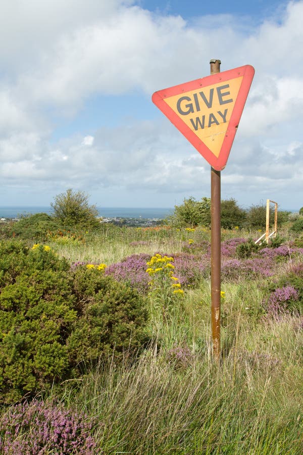 Give way sign. stock image. Image of outdoors, post, plants - 26291553