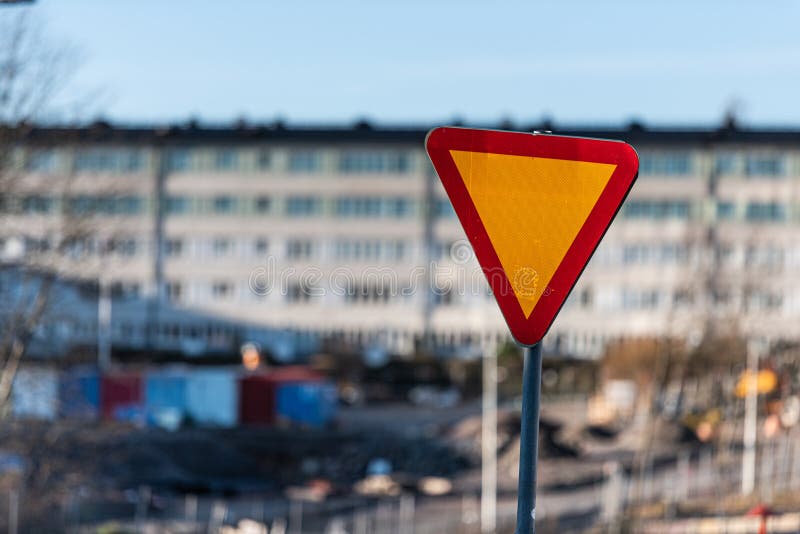 Give Way Sign in Front of a Housing Complex Stock Photo - Image of idea ...