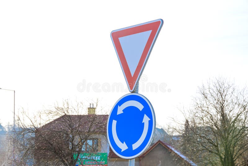 Give Way Sign at a Roundabout. Circular Motion Stock Photo - Image of ...