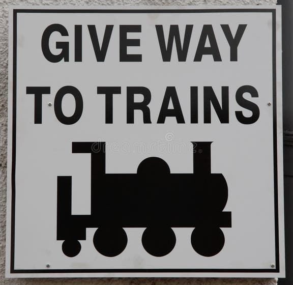 Give Way to Trains Sign stock image. Image of railroad - 1128457