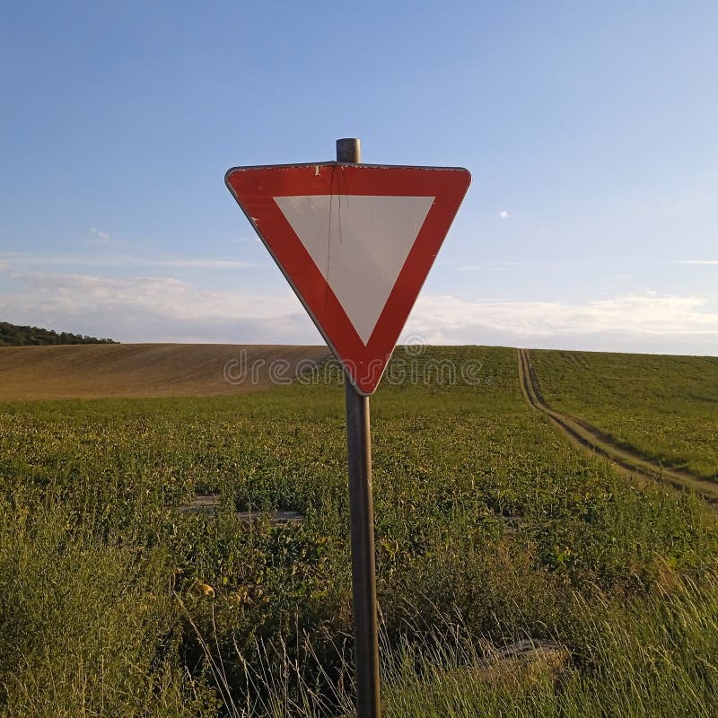 A Give Way or Yield Traffic Sign Stock Photo - Image of damage ...