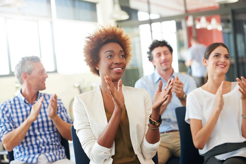 Give Yourselves a Round of Applause. a Group of Colleagues Applauding a ...