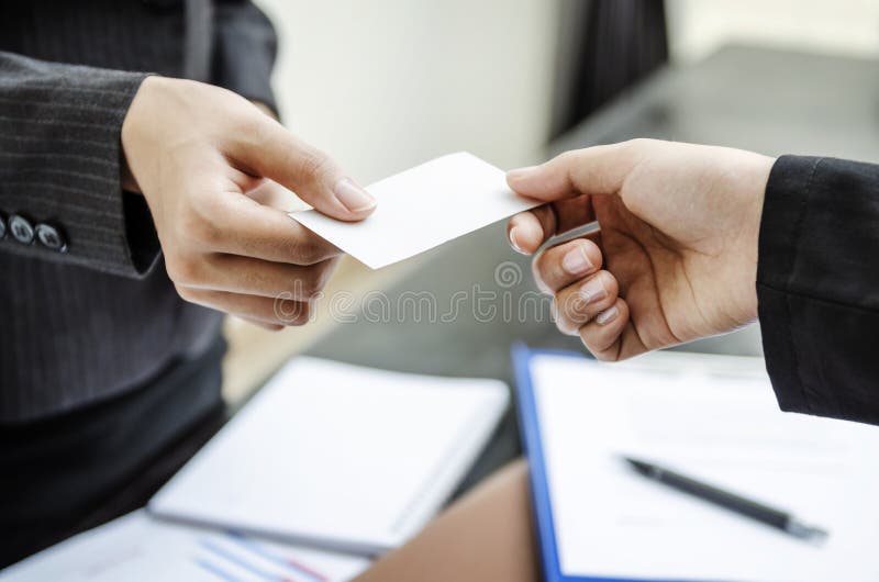 Giving business card stock photo. Image of meeting, person - 33099354