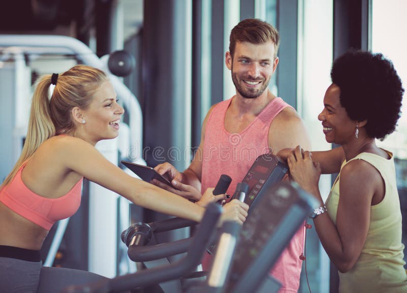 Giving Each Other Exercise Tips Stock Photo - Image of fitness ...