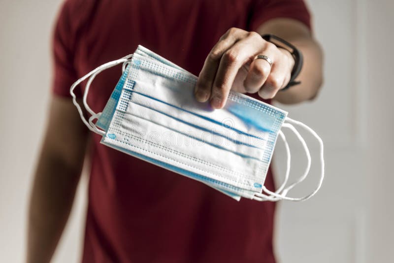 Giving face mask stock image. Image of facemask, hygiene - 192300389