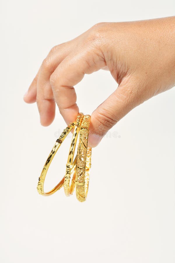 Giving the gold bracelet stock photo. Image of giving - 32498814