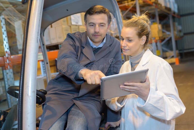 Giving hand to new hired stock image. Image of forklift - 93832691