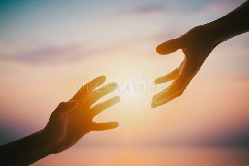 Giving a Helping Hand on Sunset Stock Photo - Image of assistance ...