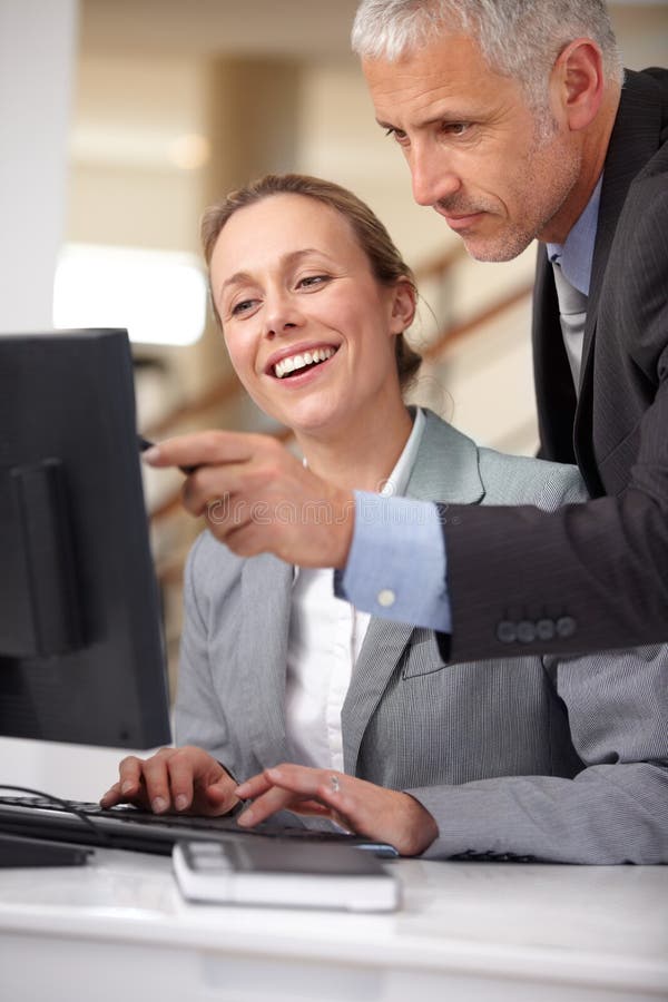 Giving Her a Couple of Pointers. a Senior Executive Over-seeing the ...