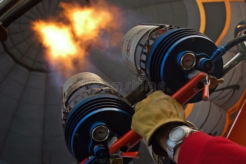 Giving the Hot Air Balloon a Boost Stock Photo - Image of copy, yellow ...