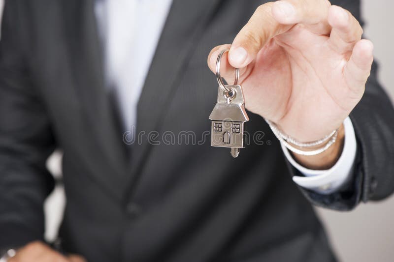 Giving house keys stock image. Image of hand, buying - 64232651