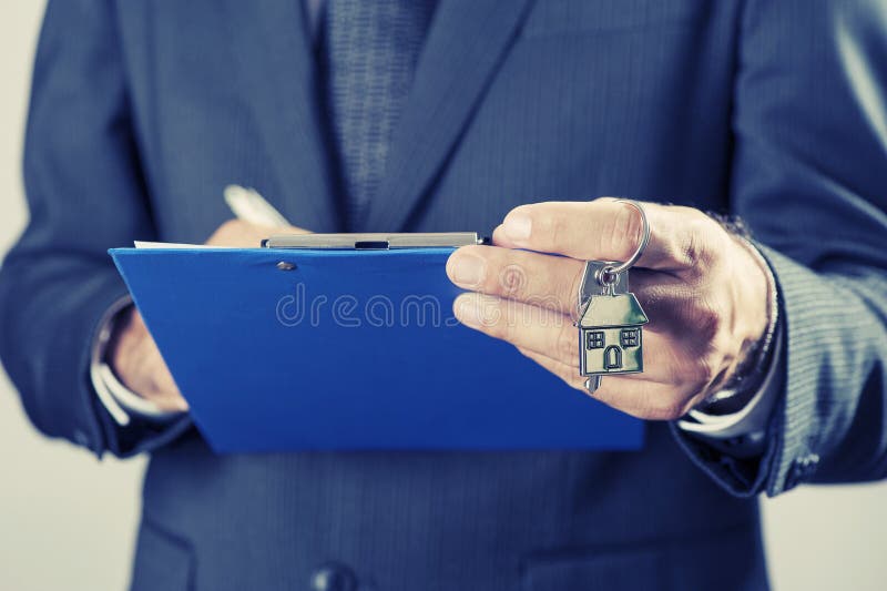 Giving house keys stock image. Image of handing, keys - 66914217