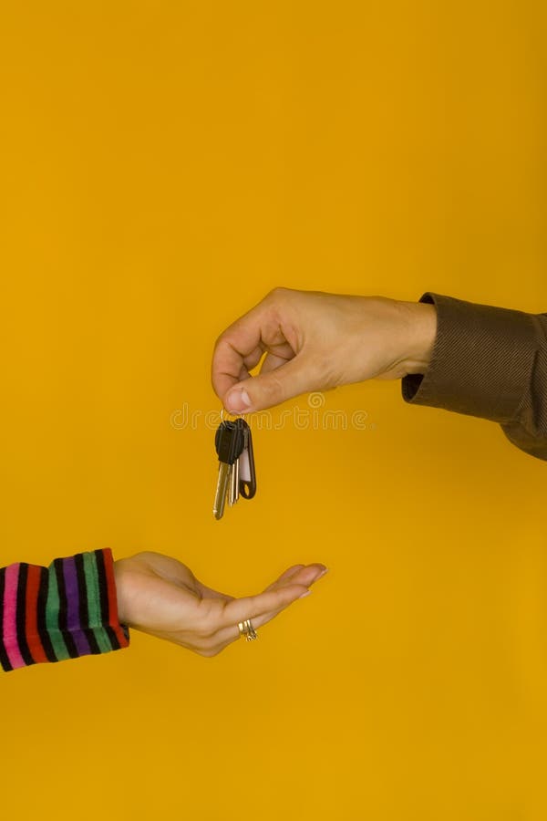 Giving Keys stock image. Image of business, locks, downpayment - 2600925