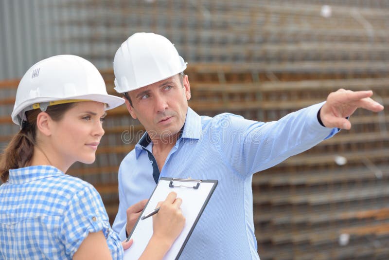 Giving orders on site stock image. Image of hard, male - 124014949