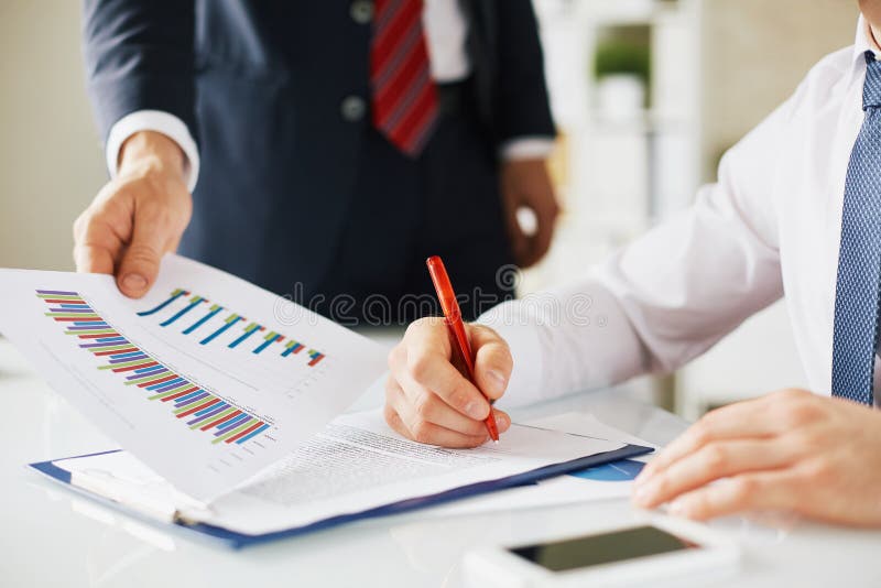 Giving paper to boss stock photo. Image of person, young - 57481168