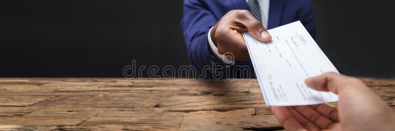 Giving Payroll Cheque stock photo. Image of hand, space - 259420668