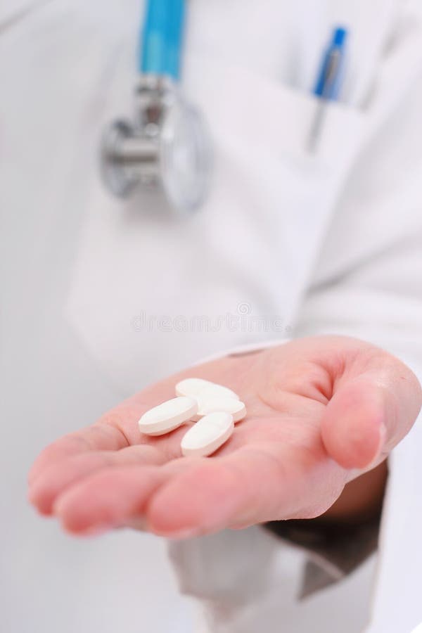 Giving pills. stock image. Image of bottle, close, healthcare - 17806193