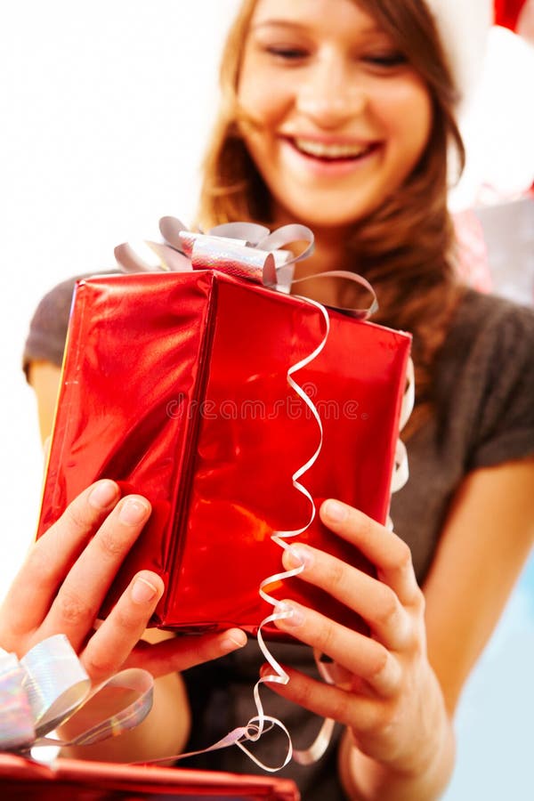 Giving a present stock photo. Image of holding, background - 12037108