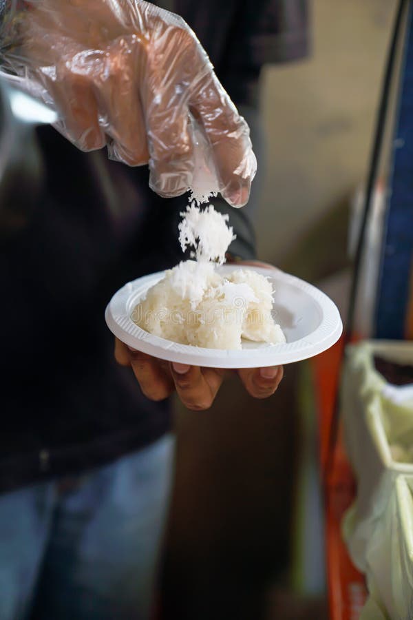 Giving the Sticky Rice Grated Coconut Stock Image - Image of person ...