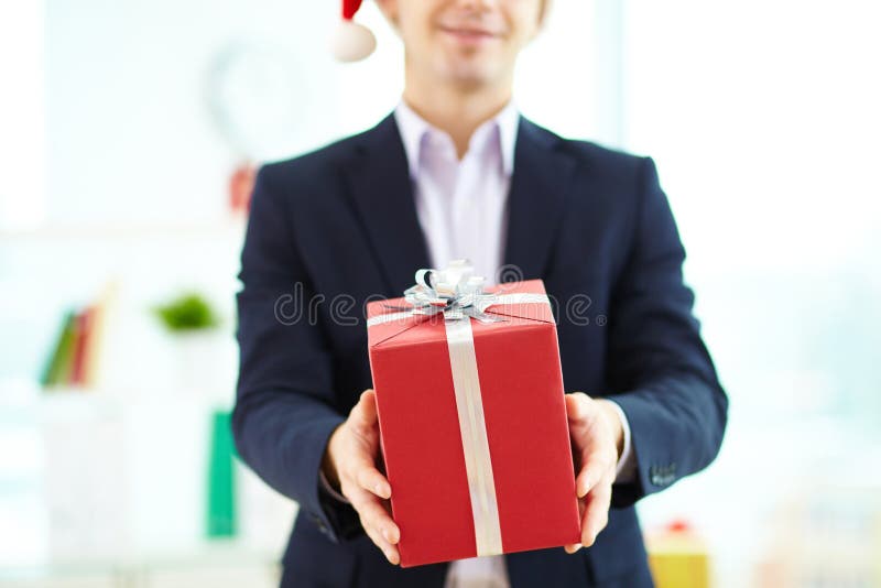 Giving xmas present stock image. Image of event, businessman - 34795015