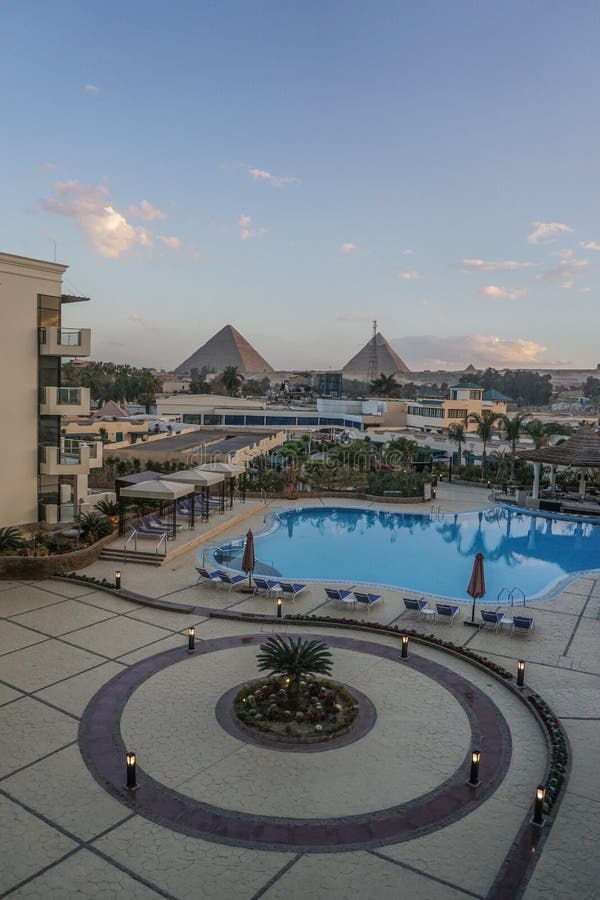 Giza, Egypt: the Pyramids Viewed from a Modern Hotel Stock Photo ...