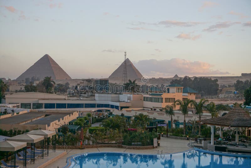 Giza, Egypt: the Pyramids Viewed from a Modern Hotel Stock Photo ...