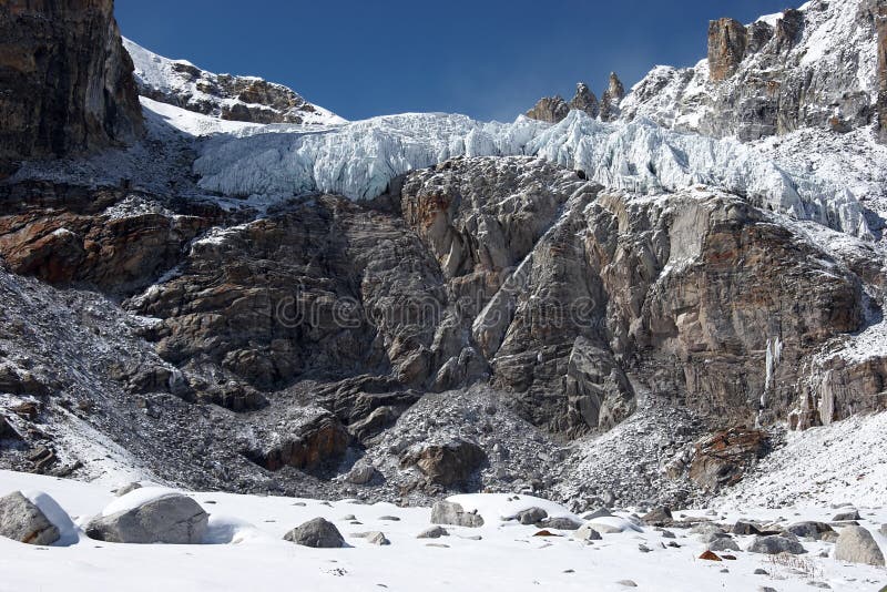 Glacier Above Dangerous Rocky Cliff, Himalayas, Nepal Stock Image ...