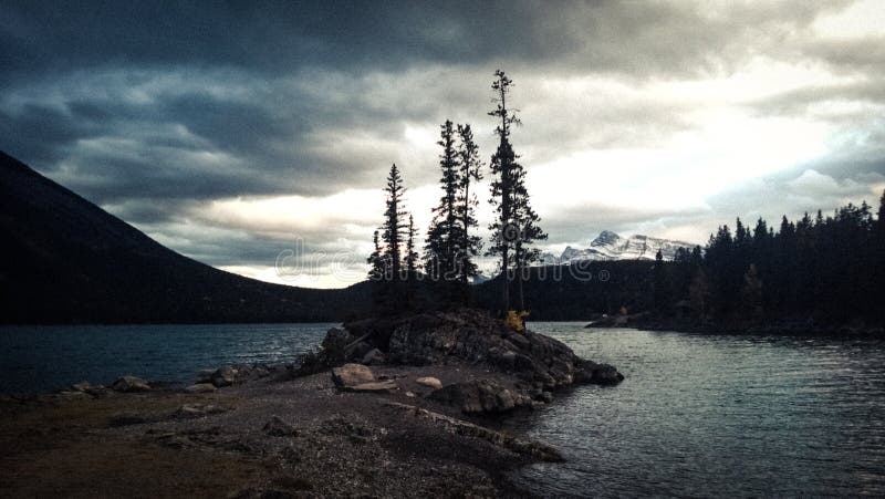Glacier Lake Mountain Storm Clouds Island Stock Photo - Image of hike ...