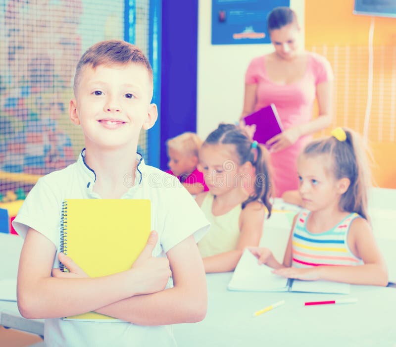 Glad Boy Pupil Standing in Elementary School Class Stock Photo - Image ...