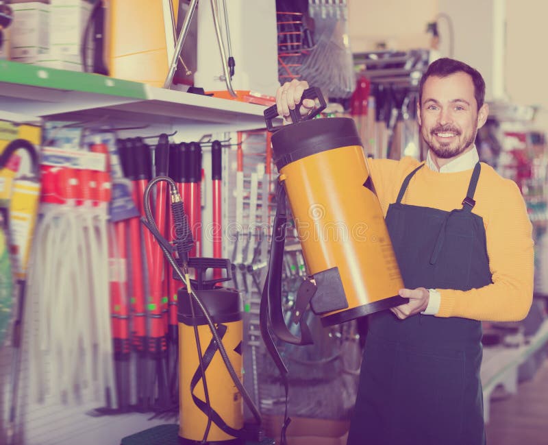 Glad Guy Deciding on Best Garden Sprayer Stock Image - Image of garden ...