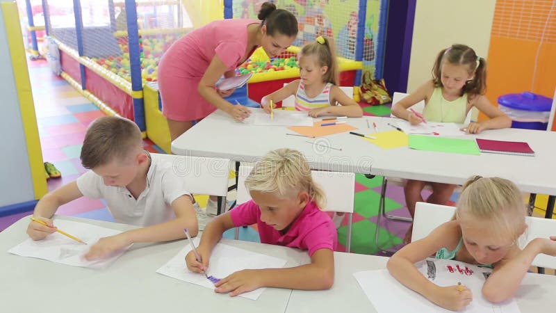 Glad Kids Drawing on Lesson Stock Footage - Video of markers, positive ...
