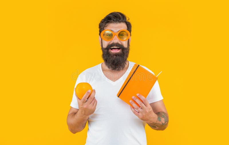 Glad Millennial Man with Planner in Studio. Millennial Man with Planner ...